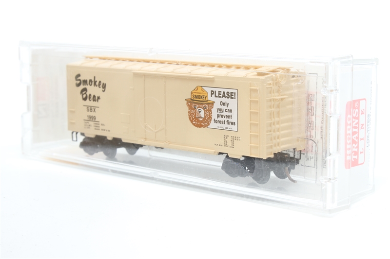 Micro-Trains 21260 40' steel plug door boxcar of the Smokey Bear - tan