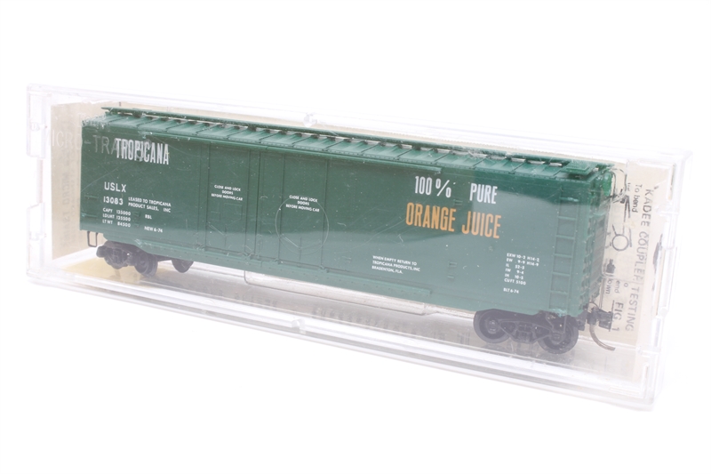Micro-Trains 36010 50' steel double plug door boxcar of Tropicana - green